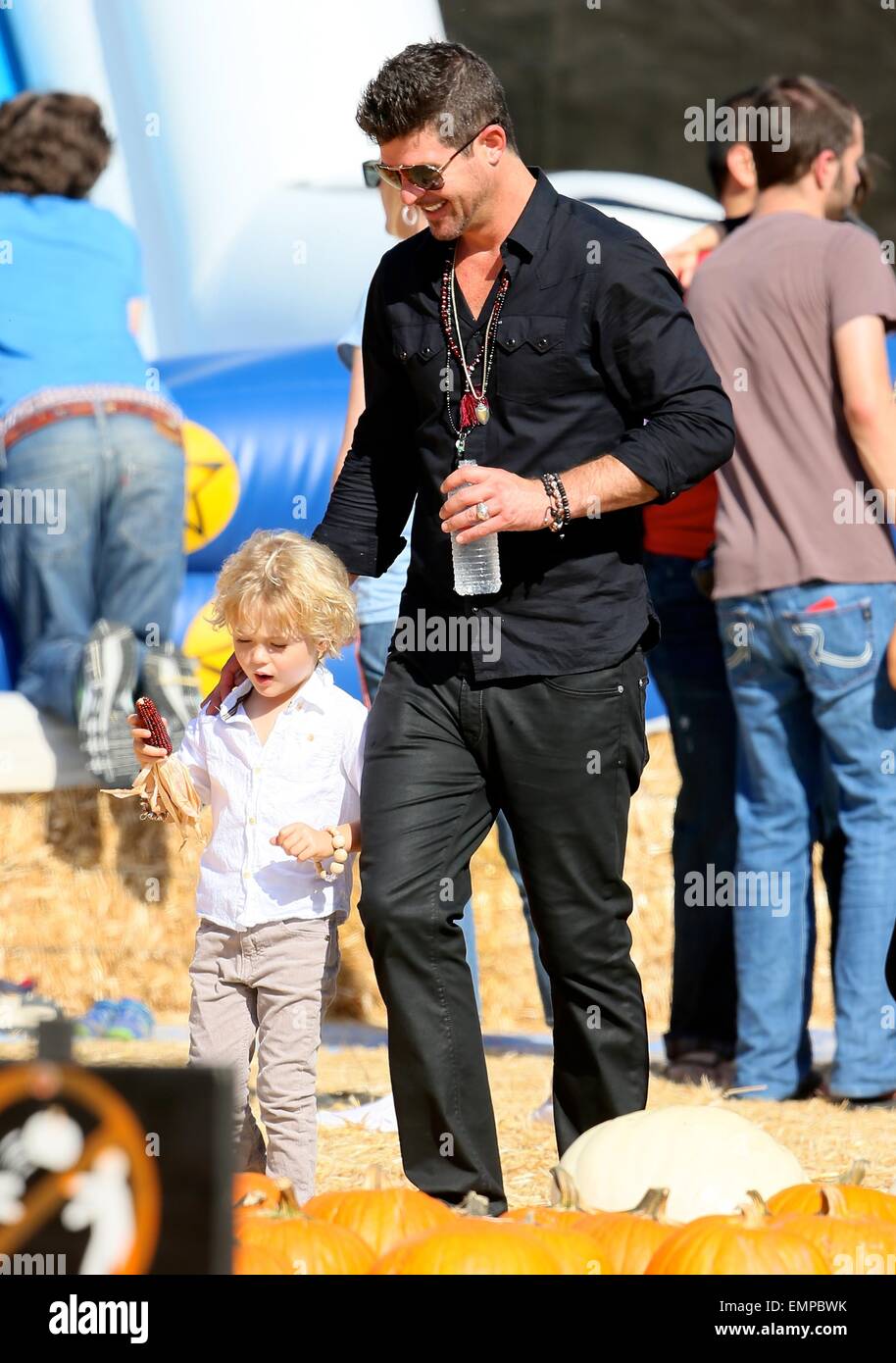 Robin Thicke visits Mr. Bones Pumpkin Patch with his son Julian ...
