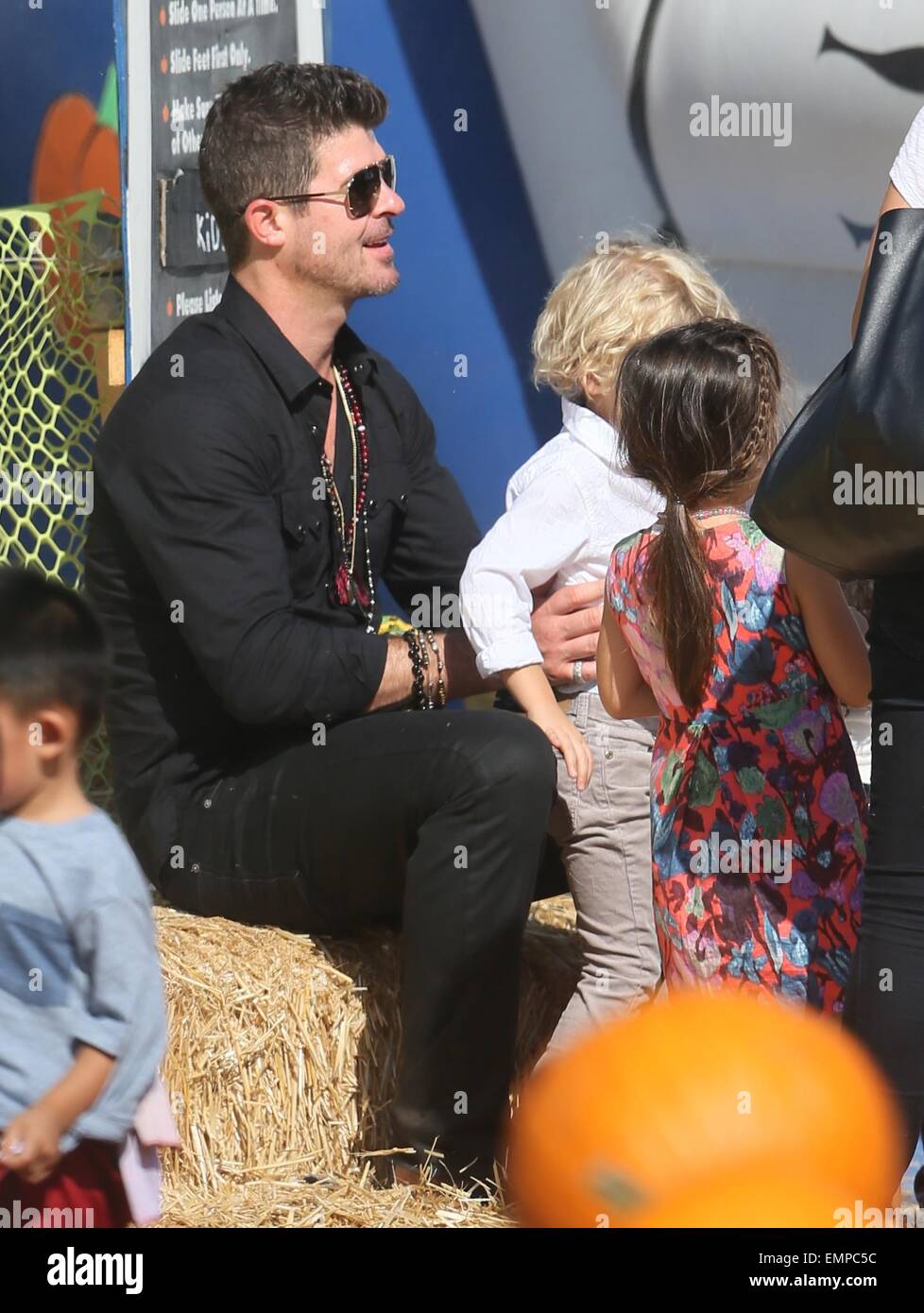 Robin Thicke visits Mr. Bones Pumpkin Patch with his son Julian ...