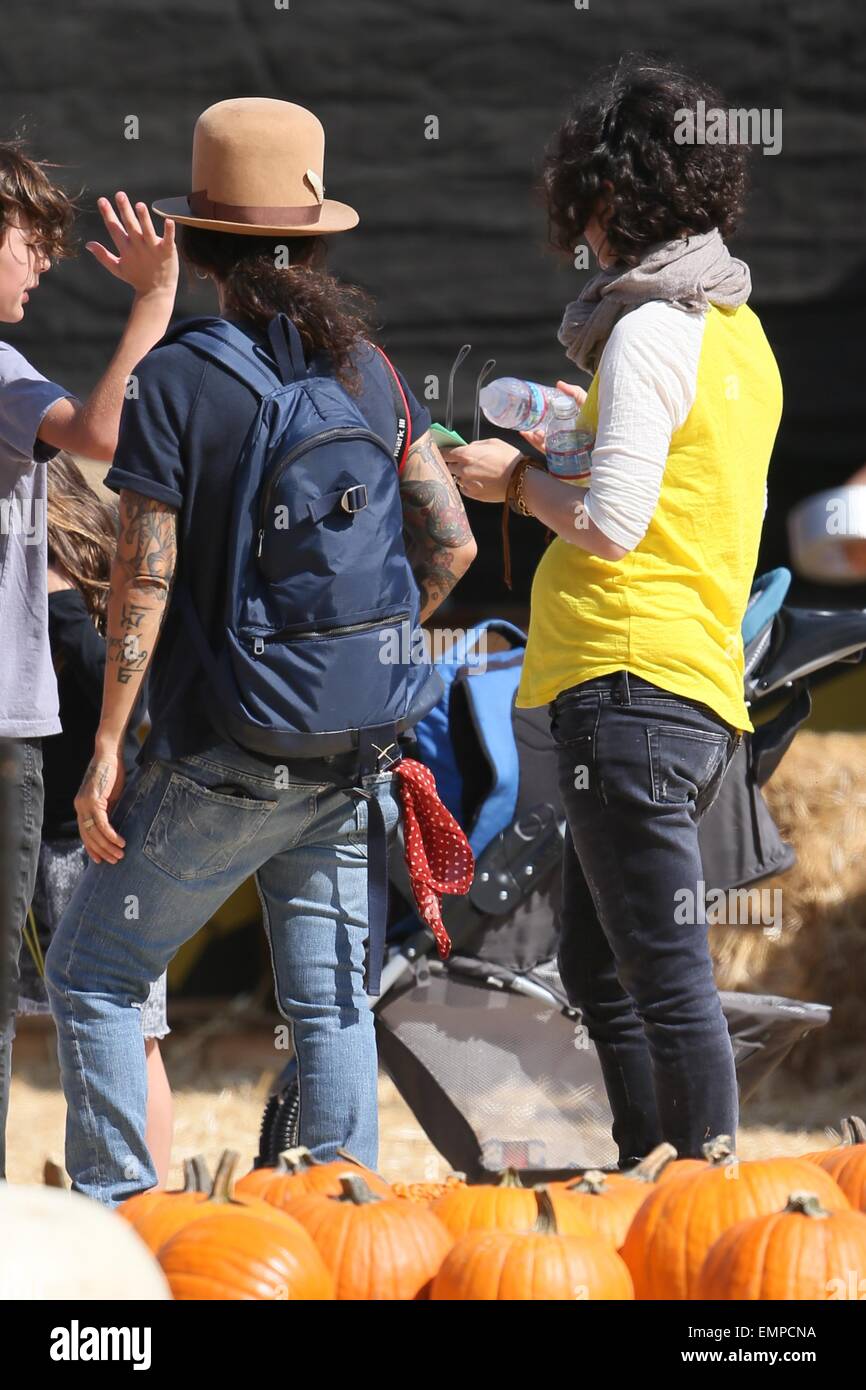 Pregnant Sara Gilbert and partner Linda Perry spend time as a family at ...
