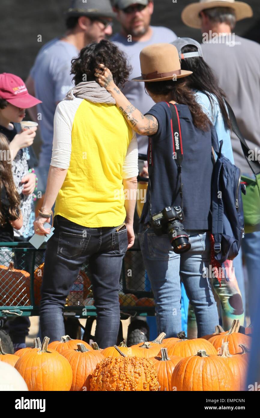 Pregnant Sara Gilbert and partner Linda Perry spend time as a family at ...