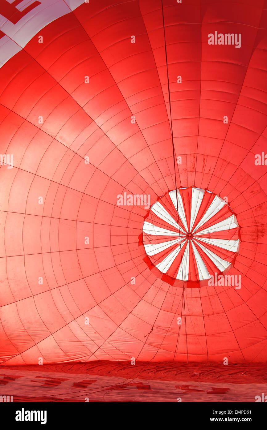 A red hot air balloon being inflated, Canton of Bern, Switzerland Stock ...