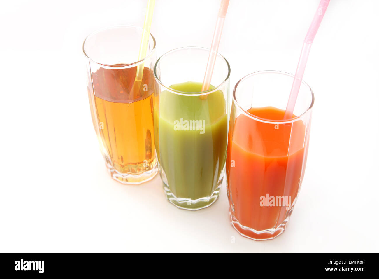 Various glasses of juices isolated on white background Stock Photo - Alamy