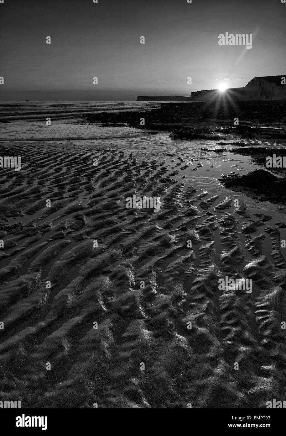 Vivid clouds and beach Black and White Stock Photos & Images - Alamy