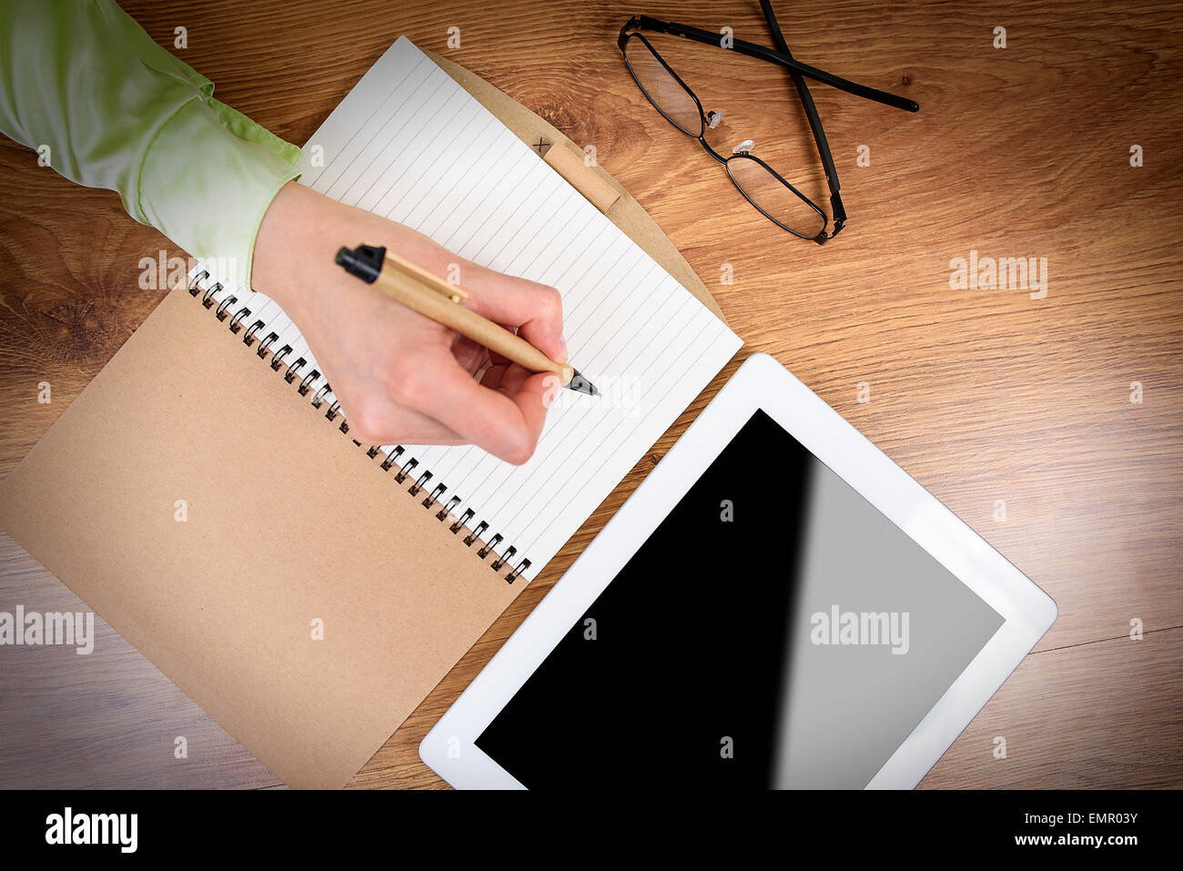 Workbook on the office desk Stock Photo - Alamy