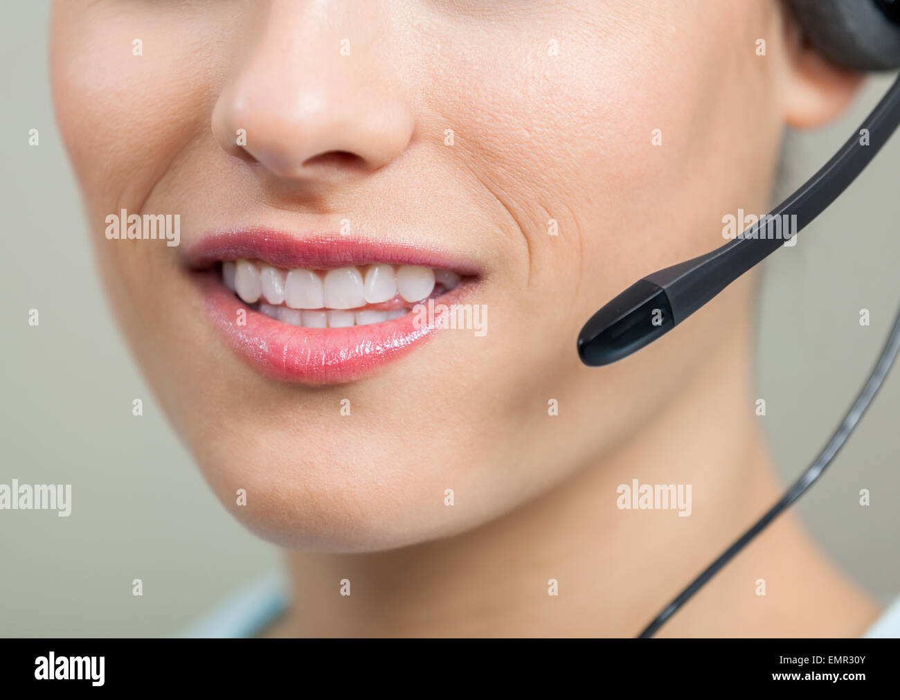 Closeup Of Smiling Customer Service Representative With Headset Stock ...
