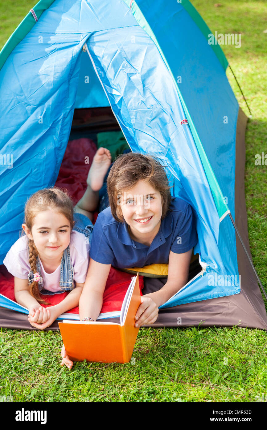 Boy reading blue book hi-res stock photography and images - Alamy