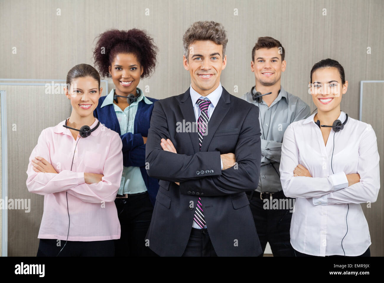 Confident Manager And Team Standing At Call Center Stock Photo - Alamy