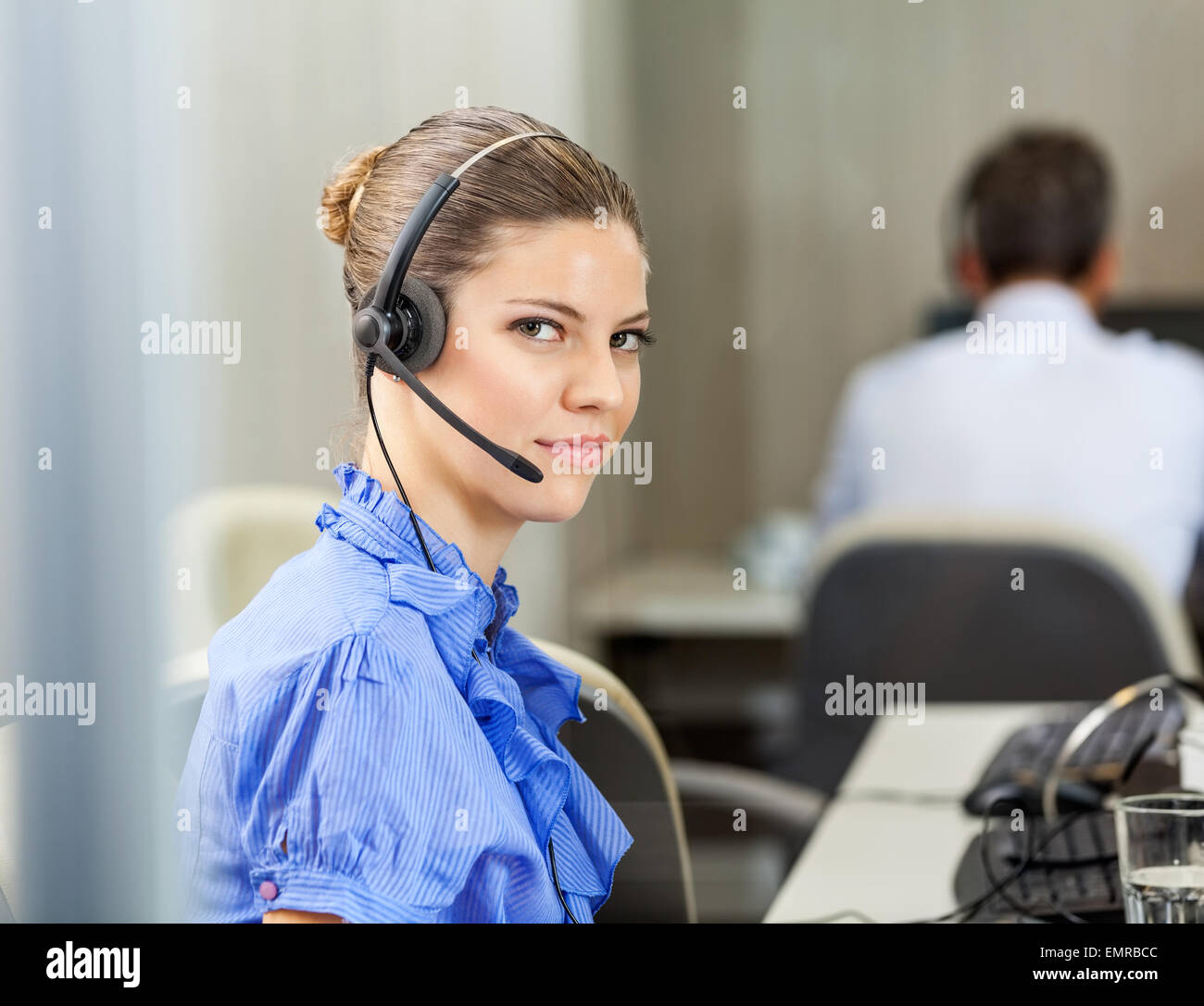 Customer Service Executive Wearing Headset At Call Center Stock Photo ...