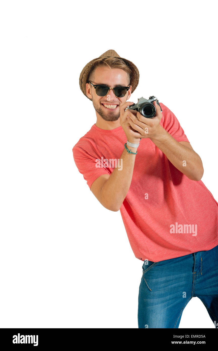 Young handsome traveler tourist with camera and backpack Stock Photo ...