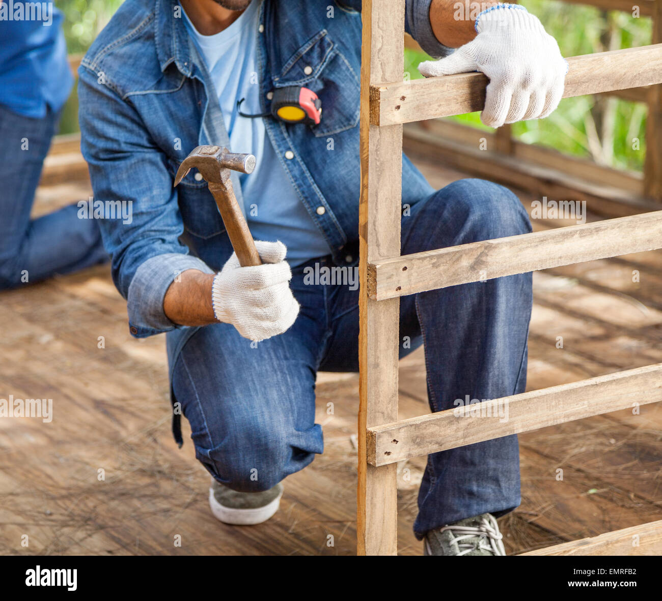 Construction Workers Working In Wooden Cabin Stock Photo - Alamy