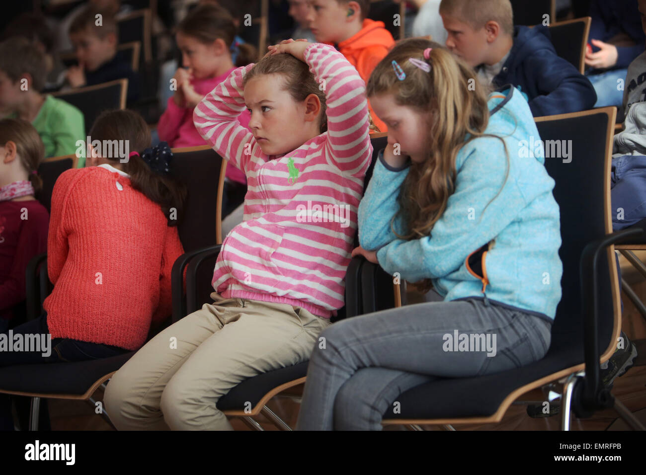 Mainz, Germany. 23rd Apr, 2015. Primary school children listen, more or ...