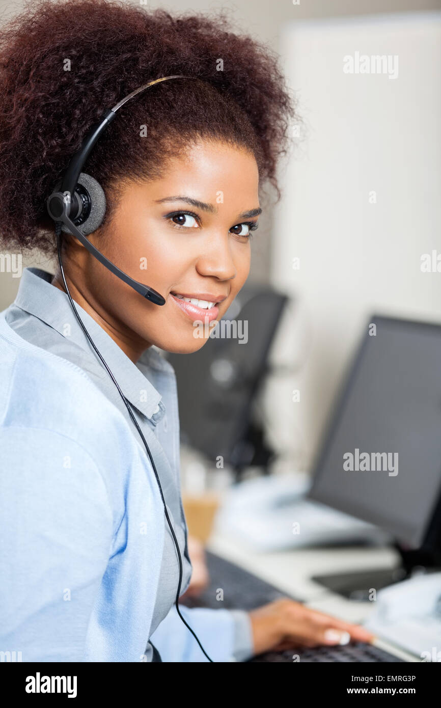 Female Customer Service Representative Wearing Headset Stock Photo - Alamy