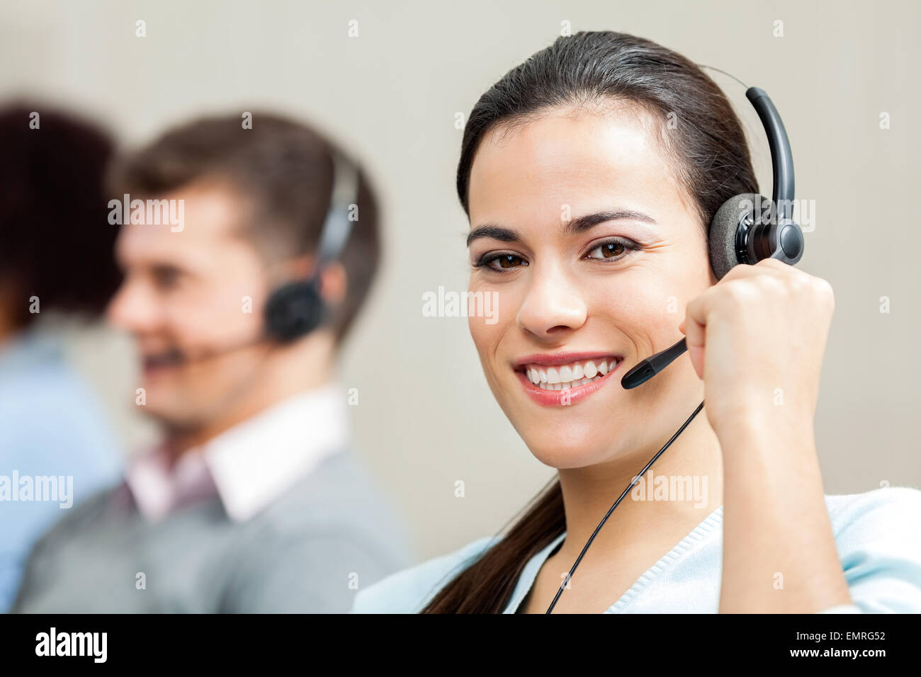 Portrait Of Confident Female Customer Service Executive Stock Photo - Alamy