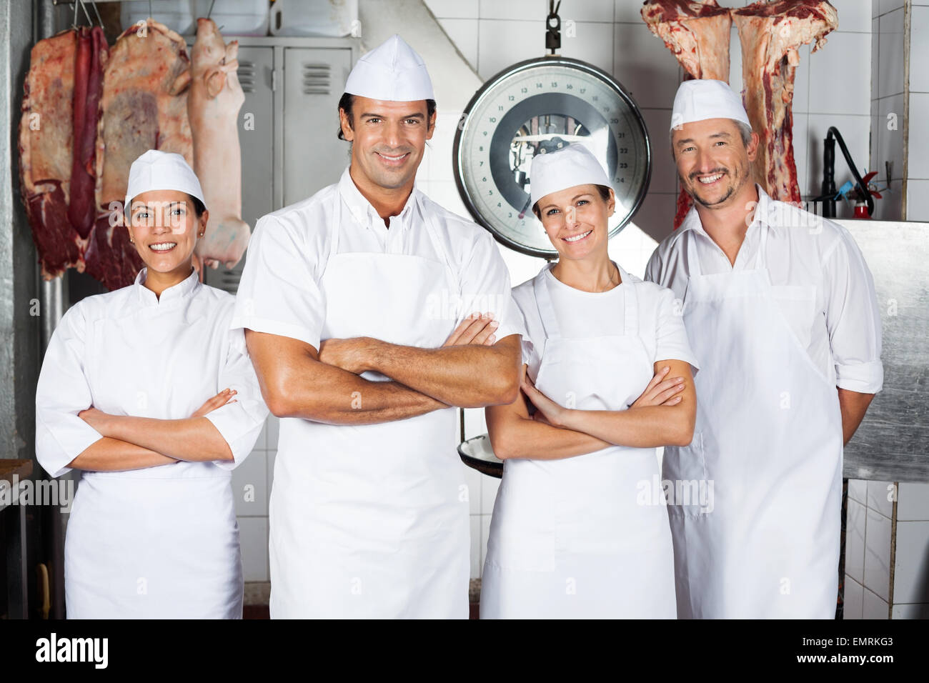 Team Of Confident Butchers Stock Photo - Alamy