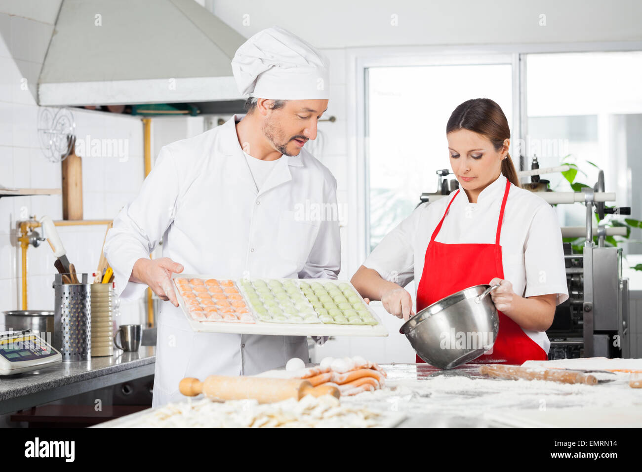 Chef preparing dough rolling cutting hi-res stock photography and images - Alamy