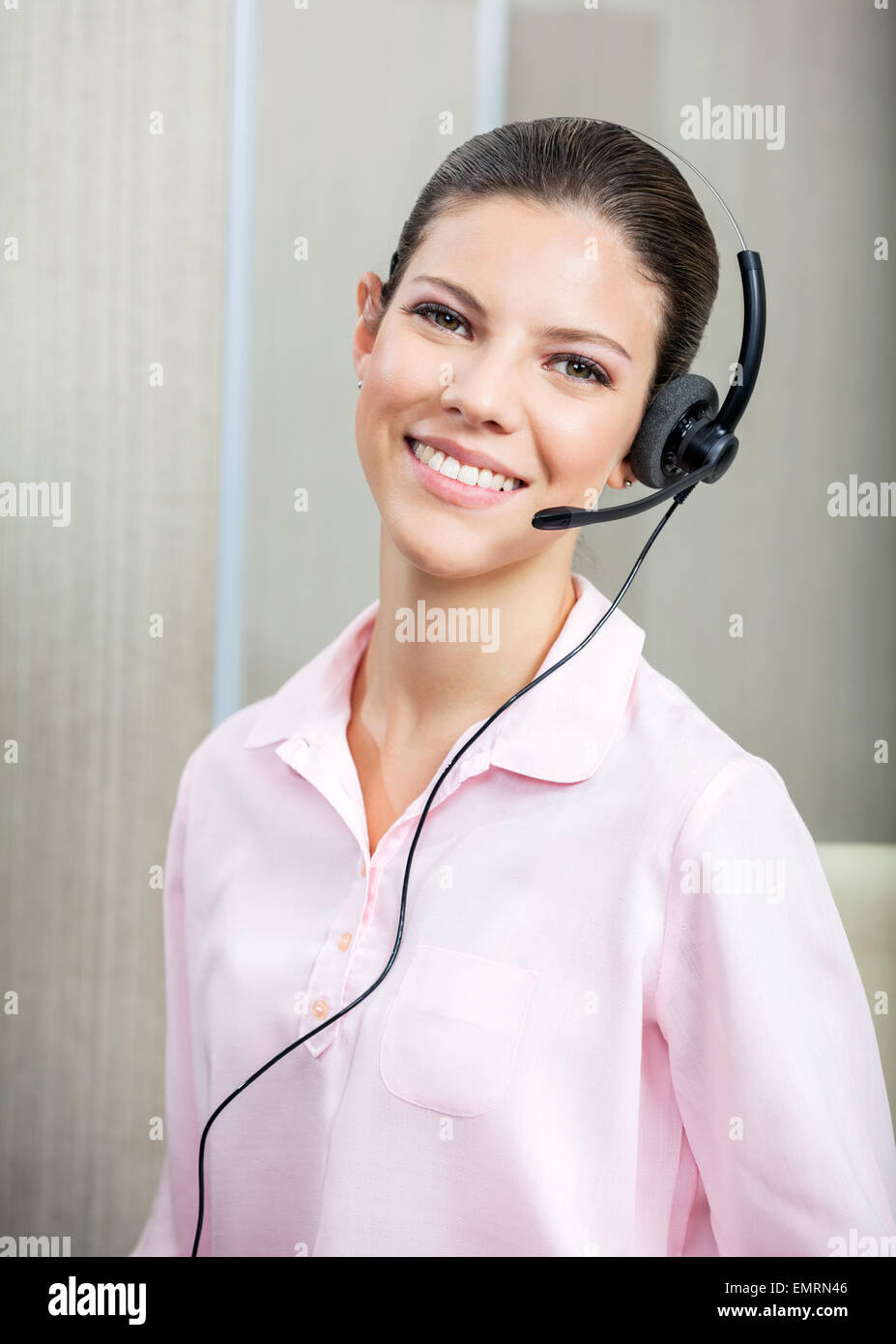 Smiling Customer Service Agent Wearing Headset In Office Stock Photo ...