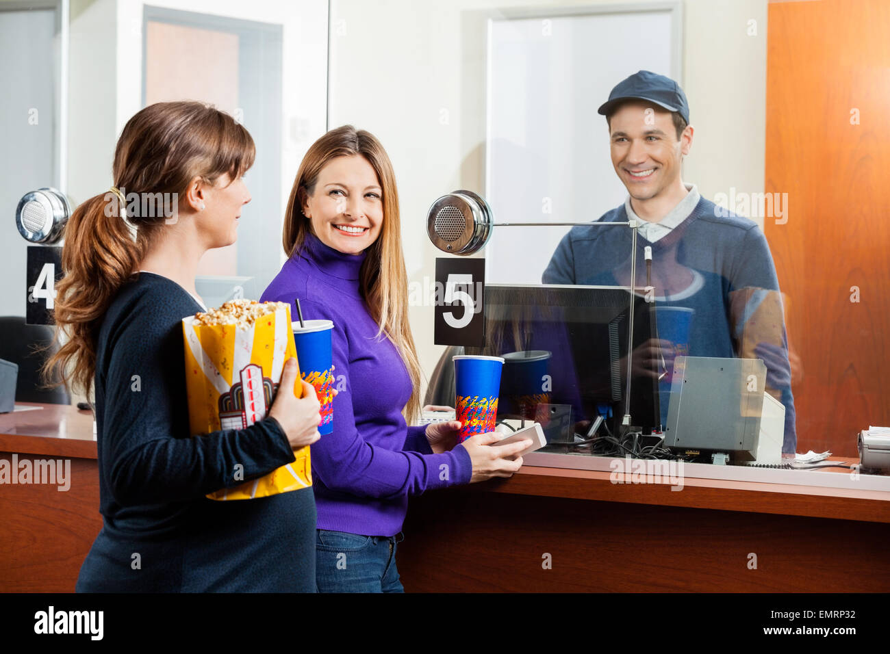 People Buying Movie Tickets Box High Resolution Stock Photography and ...