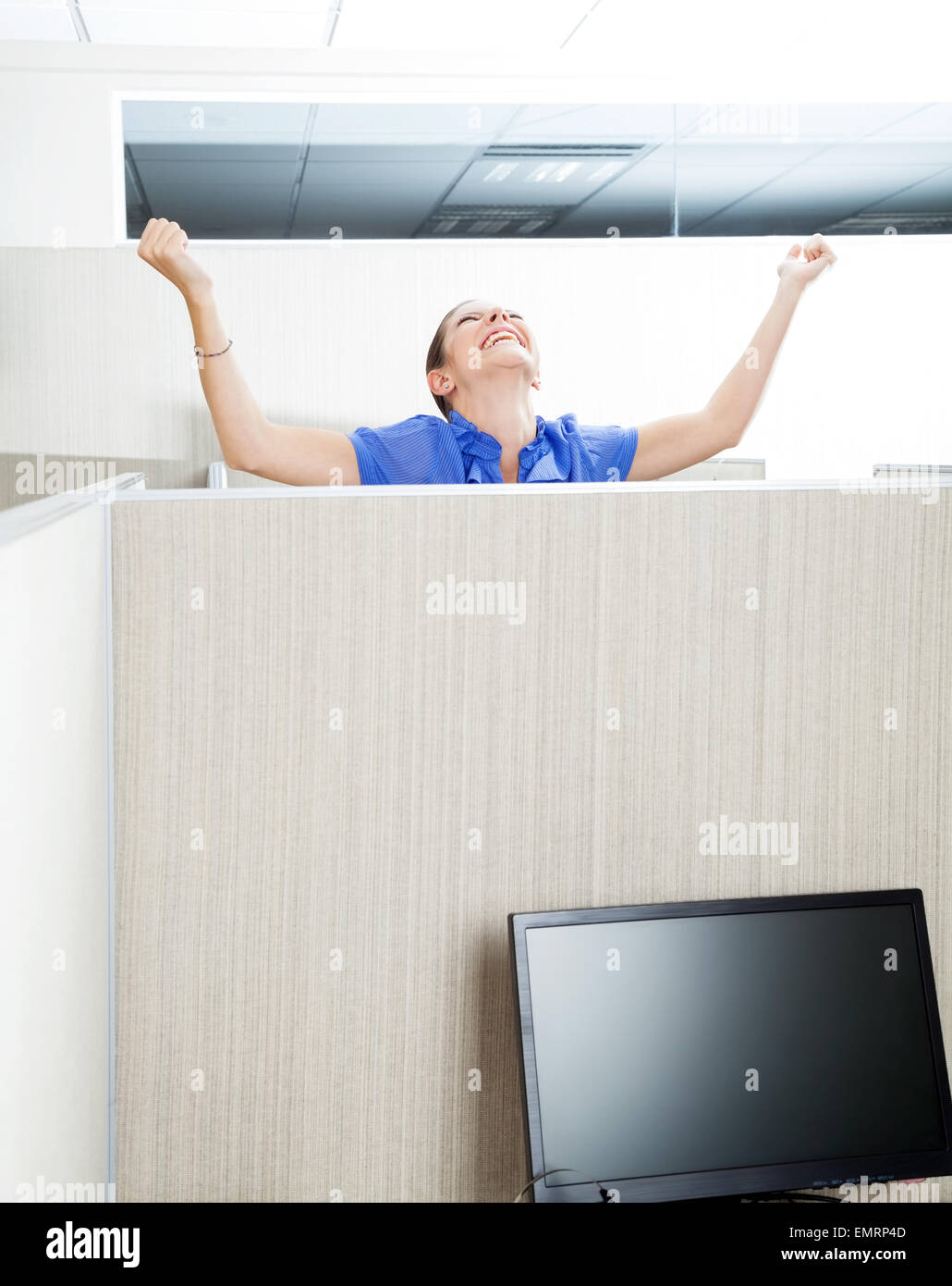 Customer Service Representative Celebrating Success In Cubicle Stock ...
