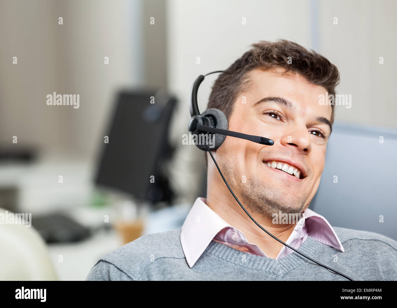 Smiling Customer Service Representative Wearing Headset Stock Photo - Alamy