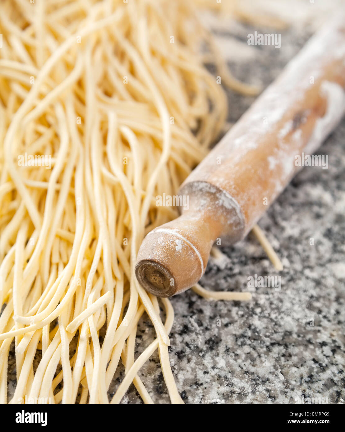 Boiled Spaghetti Pasta With Rolling Pin On Marble Counter Stock Photo ...
