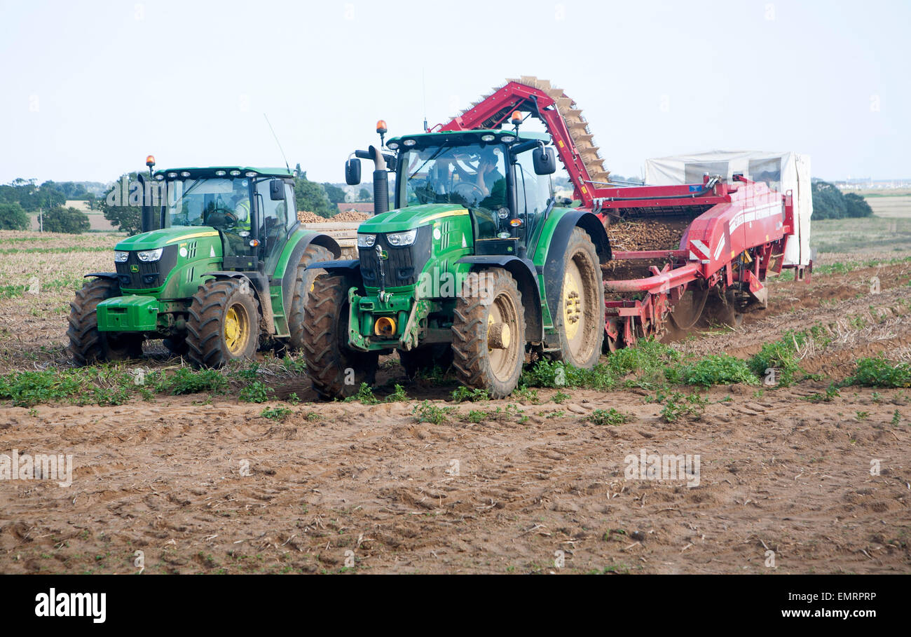 Tractors harvesting hi-res stock photography and images - Alamy