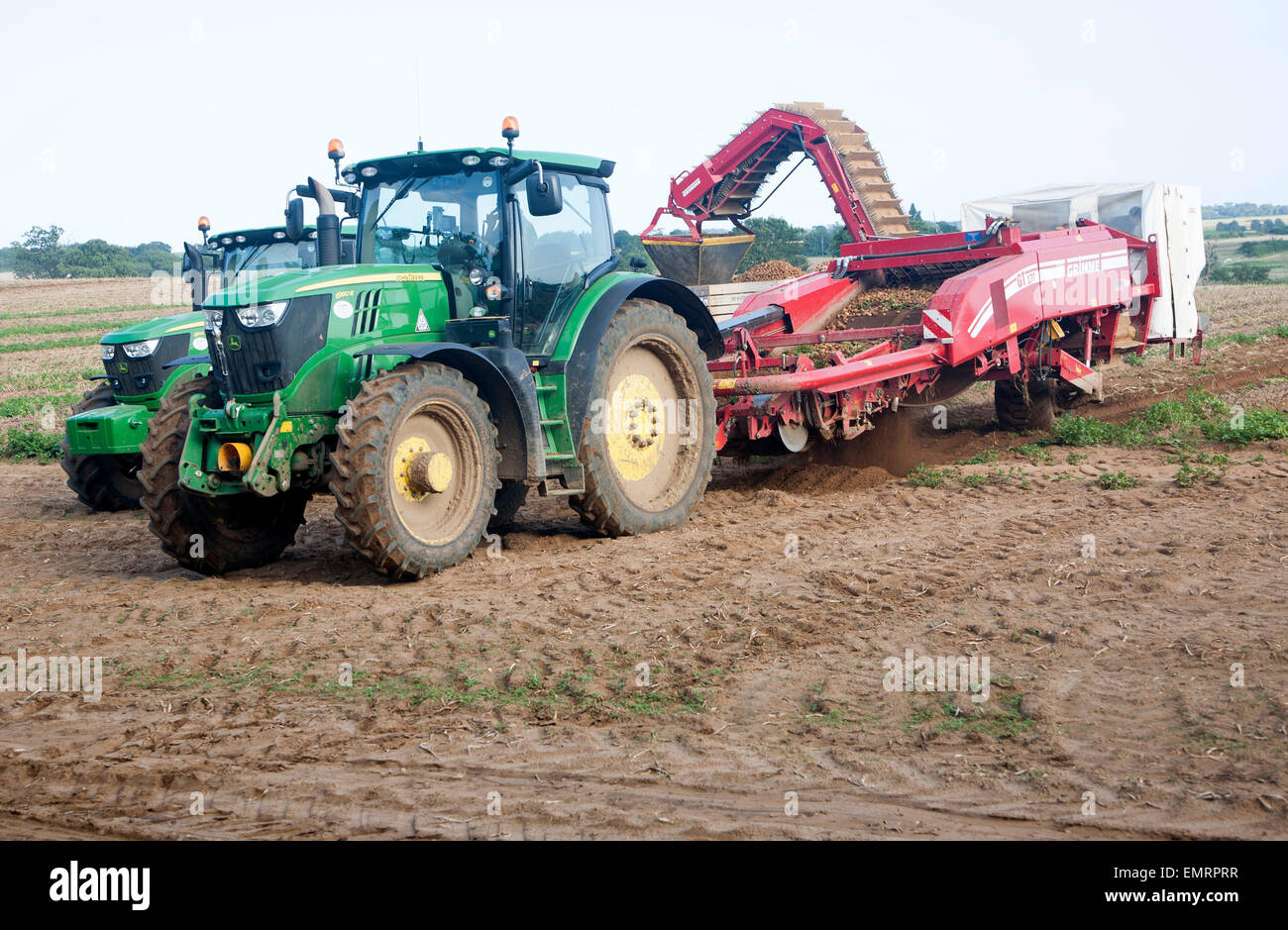 Tractors harvesting hi-res stock photography and images - Alamy