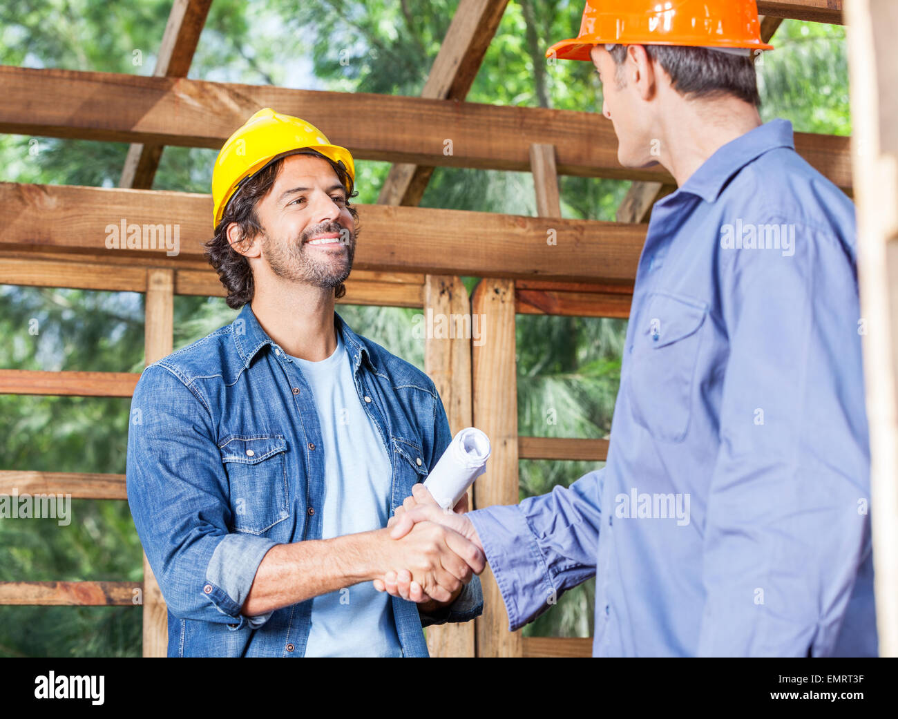 Construction manager with new building hi-res stock photography and ...