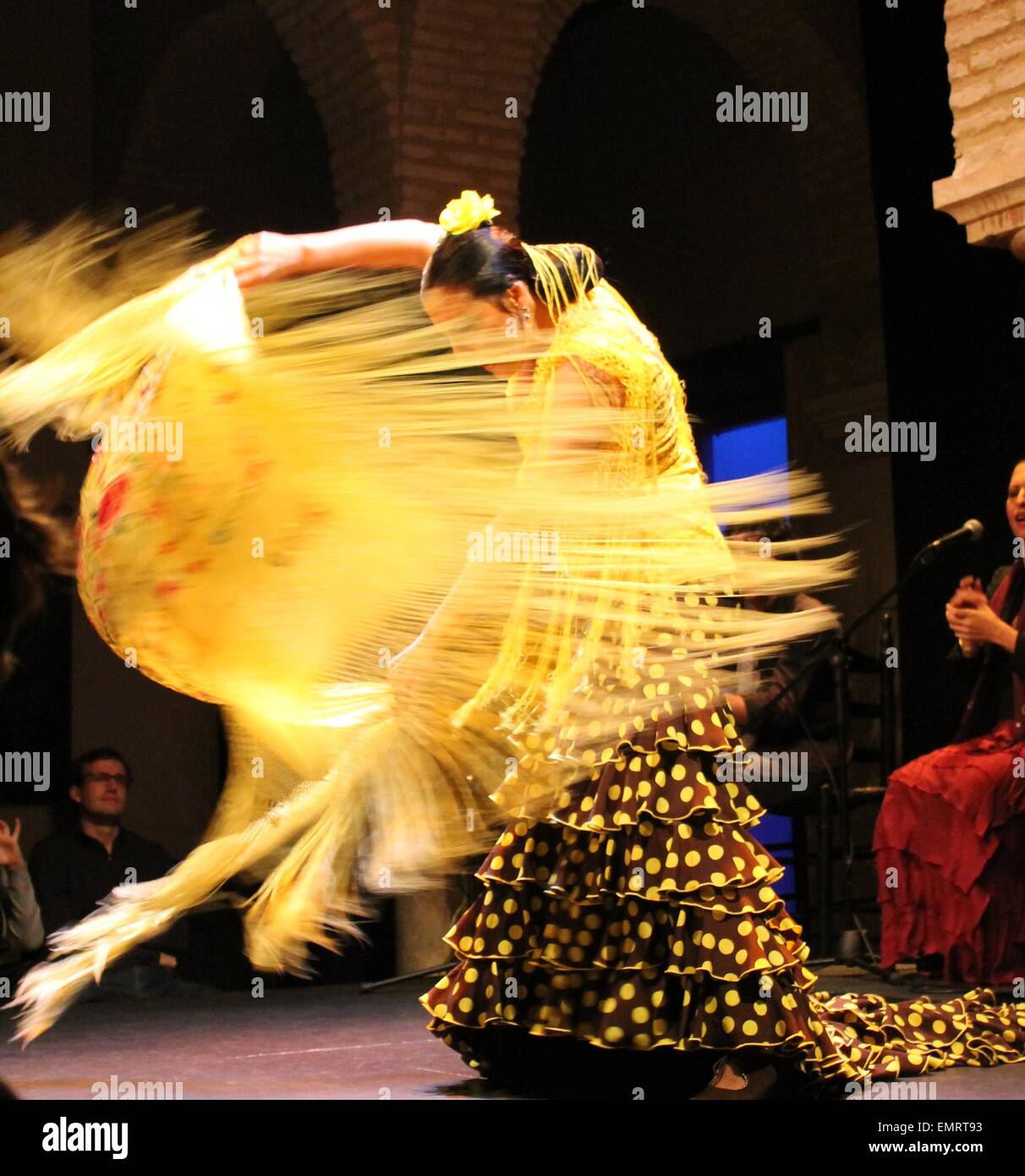 Woman traditional Spanish Flamenco dancer dancing outside in flamenco ...