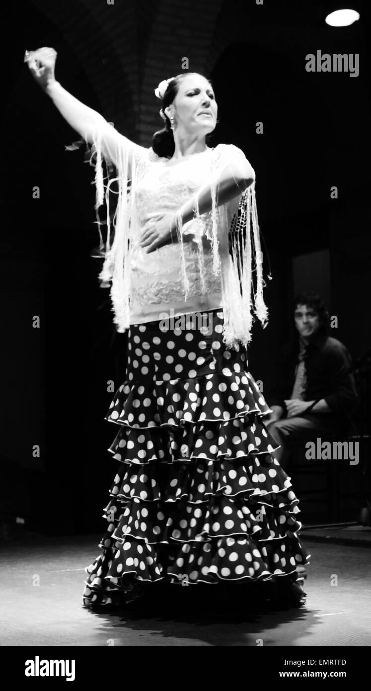 Woman traditional Spanish Flamenco dancer dancing outside in flamenco ...