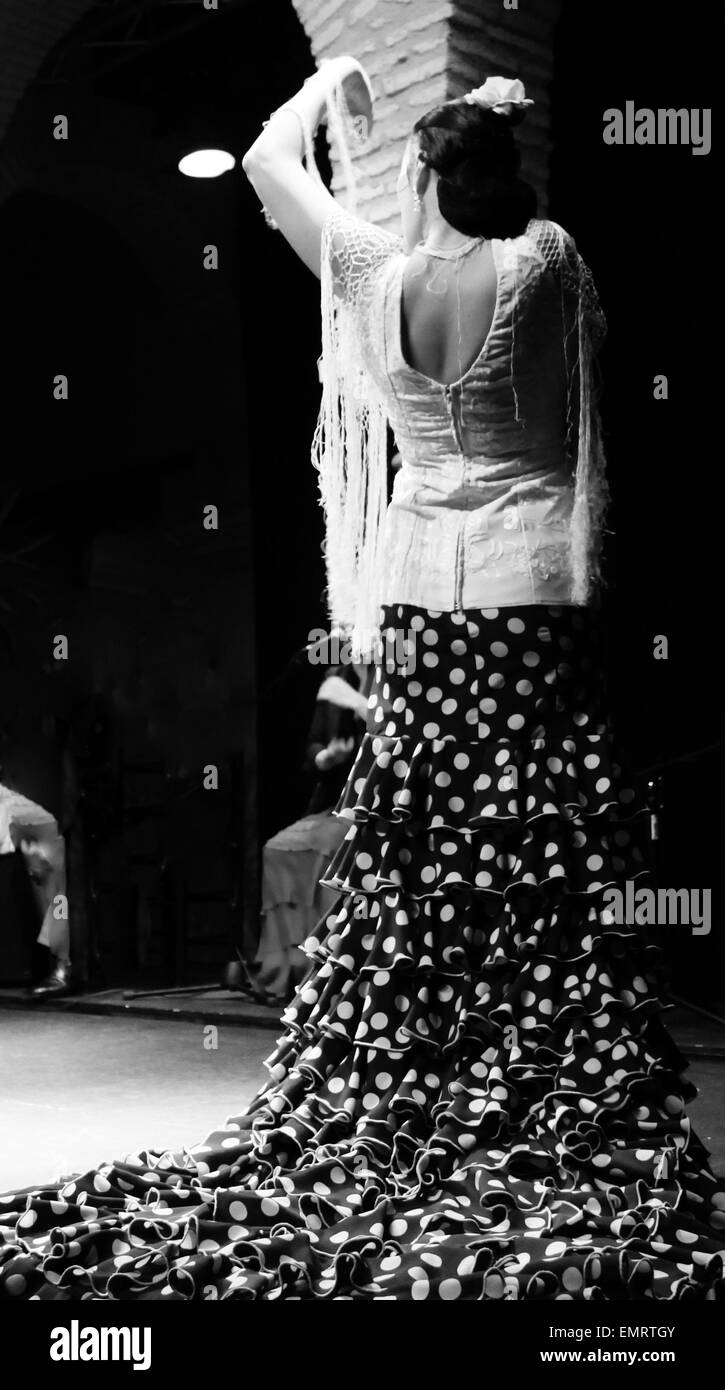 Woman traditional Spanish Flamenco dancer dancing outside in flamenco ...