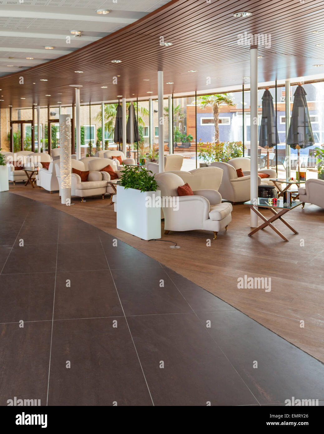 Empty modern Scandinavian design hotel lobby at the Reef Hotel & Resort ...