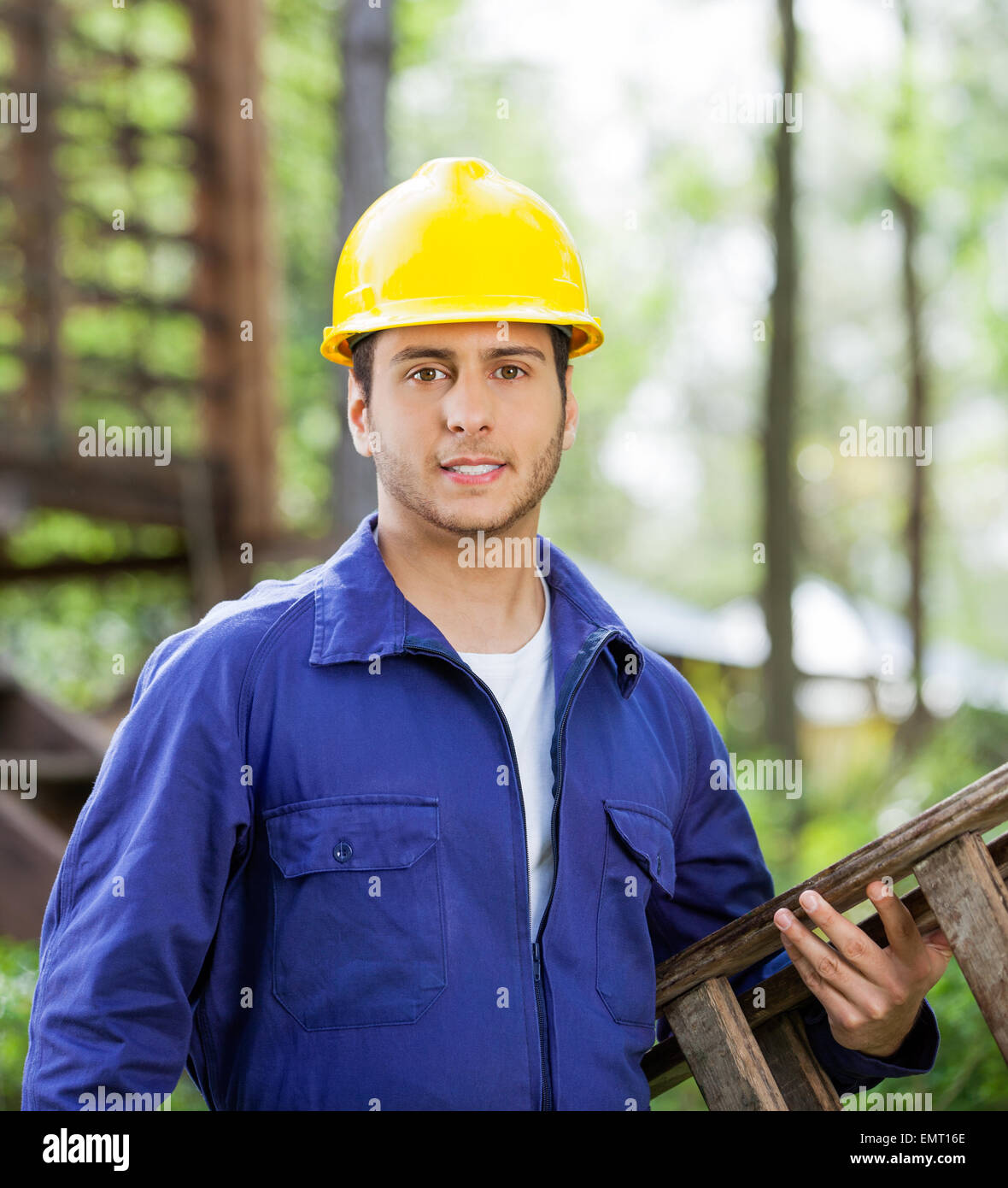 Construction worker carrying ladder hi-res stock photography and images ...