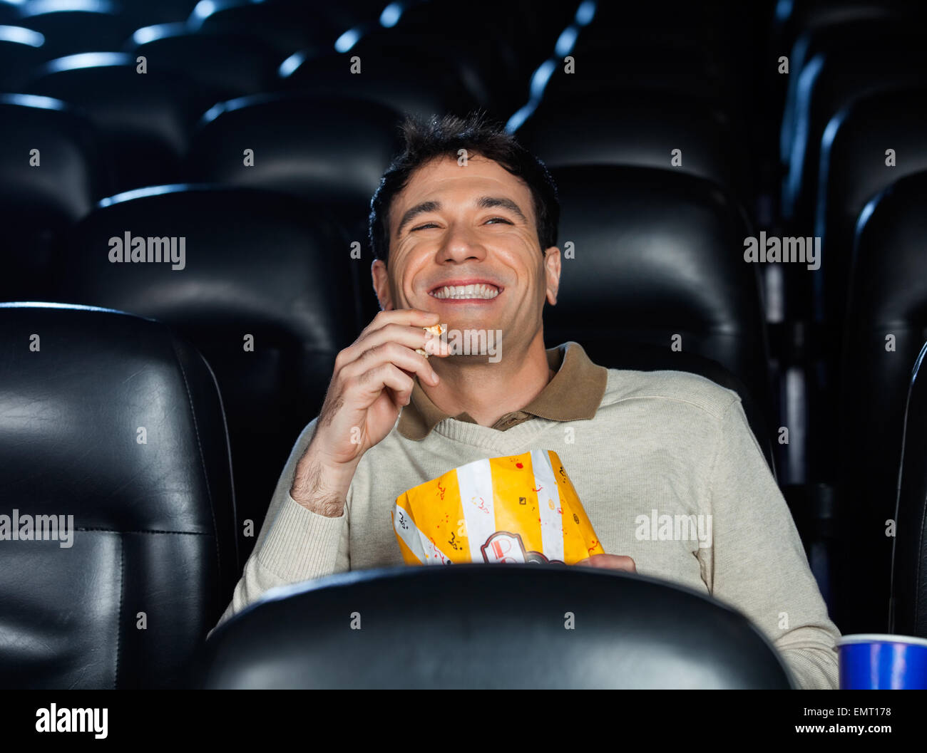 Caucasian man watching comedy movie hi-res stock photography and images ...