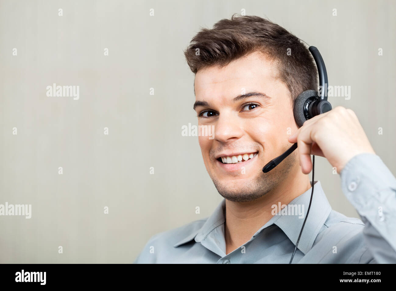 Happy Customer Service Representative Wearing Headset Stock Photo - Alamy