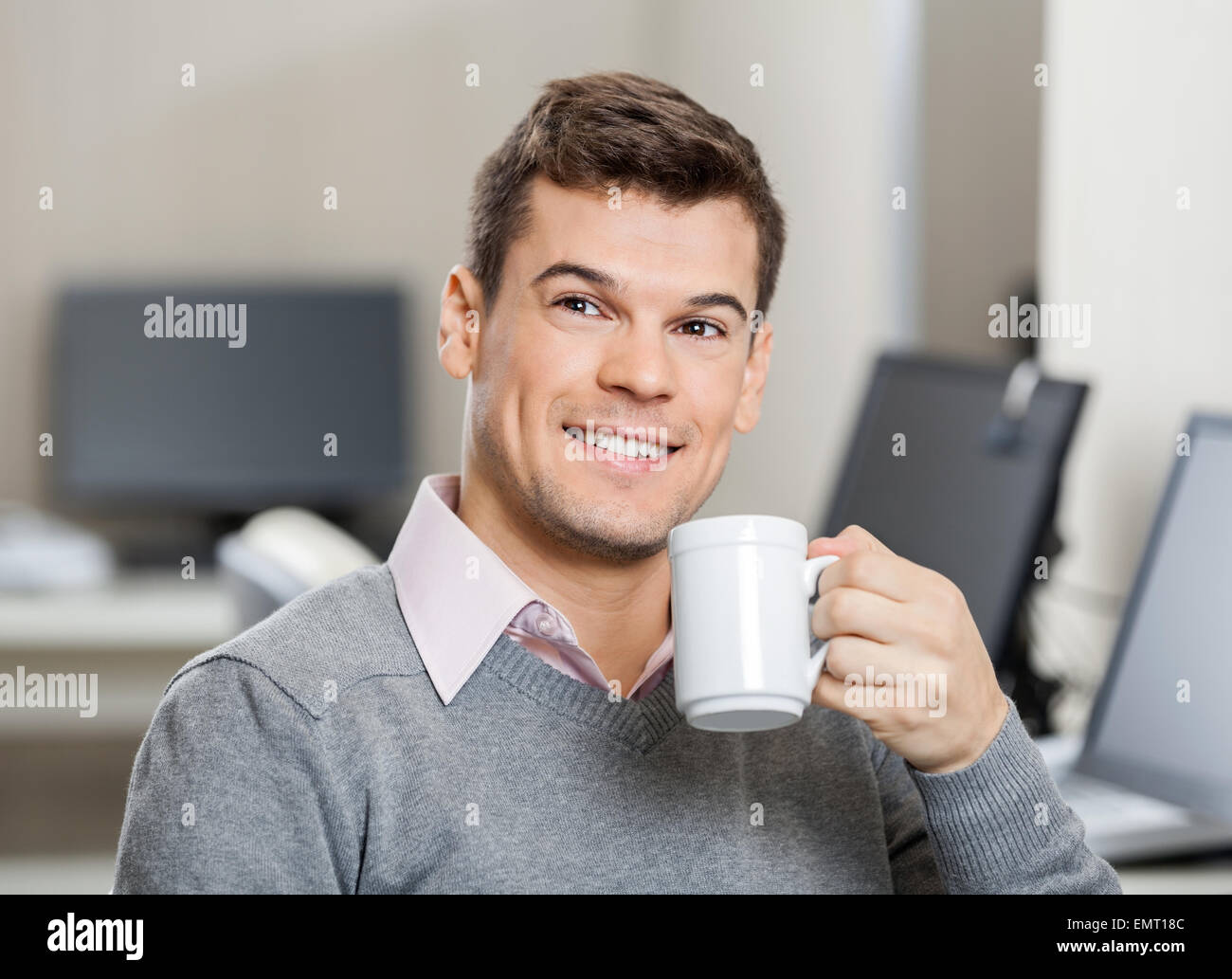 Smiling Employee Having Coffee In Call Center Stock Photo - Alamy