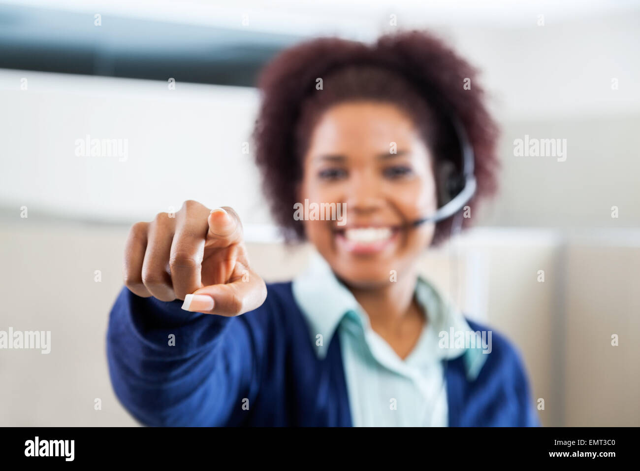 Customer Service Representative Pointing At You Stock Photo - Alamy