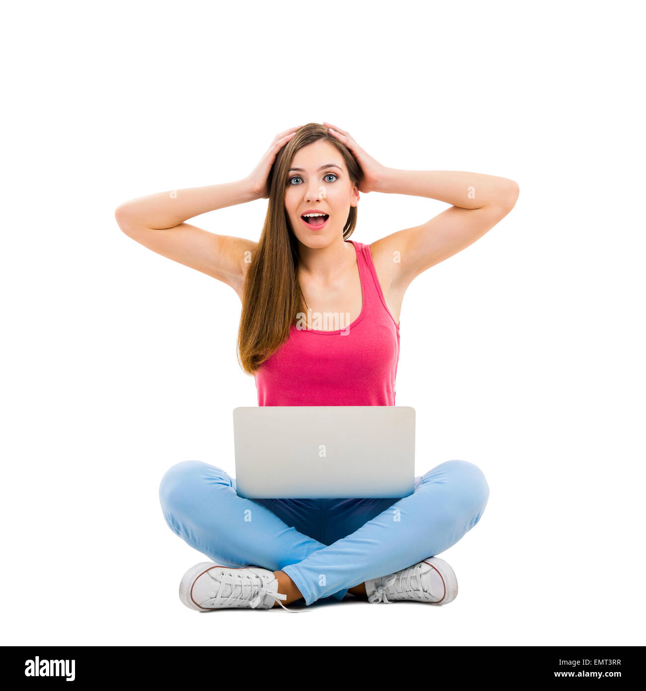 Beautiful woman sitting with crossed legs working with a laptop Stock ...