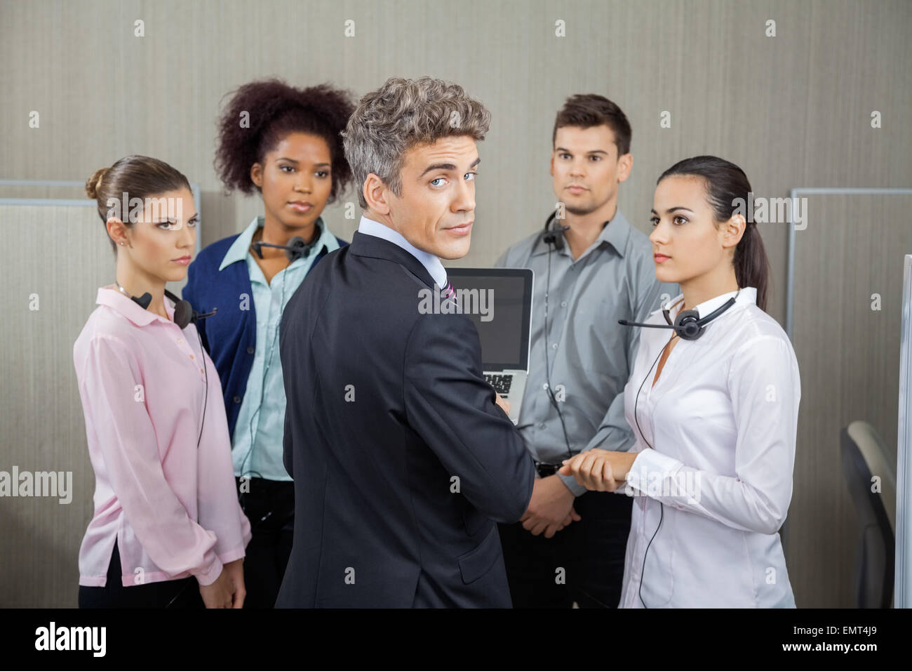 Confident Manager In Meeting With Employees At Call Center Stock Photo ...