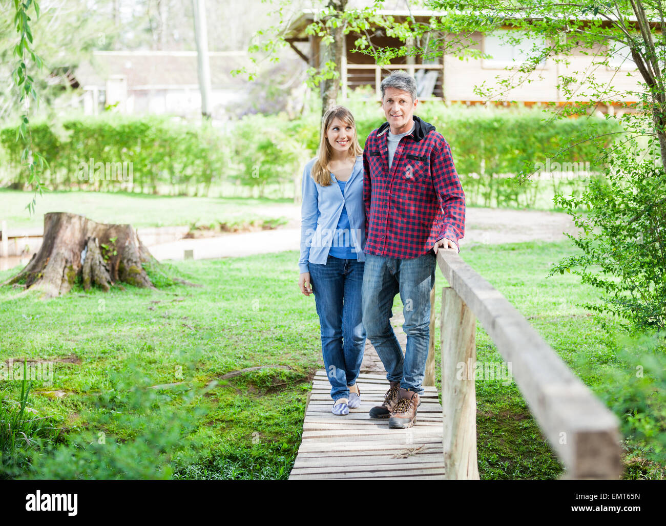 Walking on wooden bridge hi-res stock photography and images - Alamy