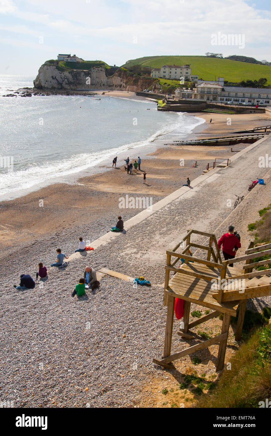 Steps to beach, people walking on promenade, sunshine on sea ...