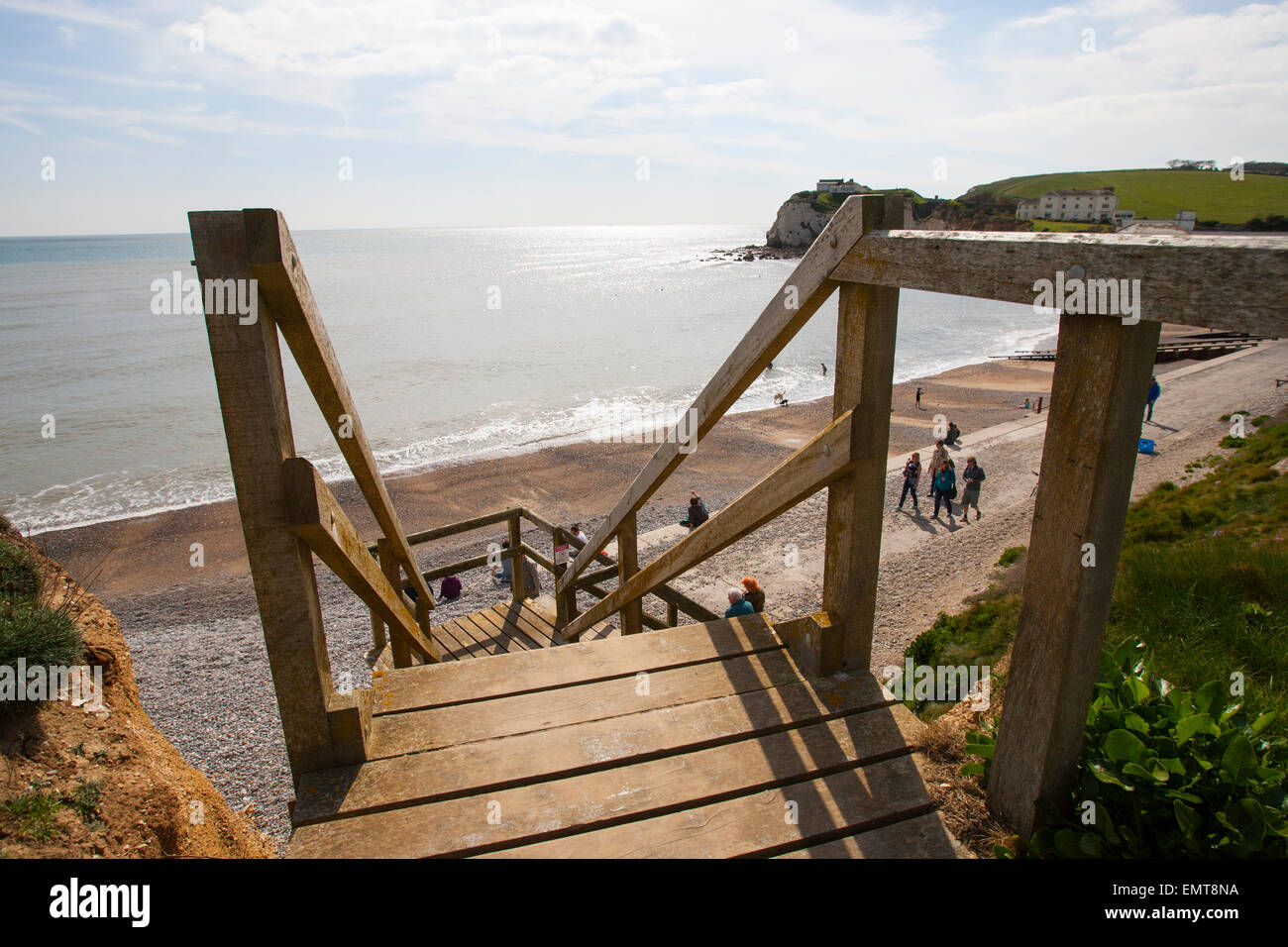 Steps to beach, people walking on promenade, sunshine on sea ...