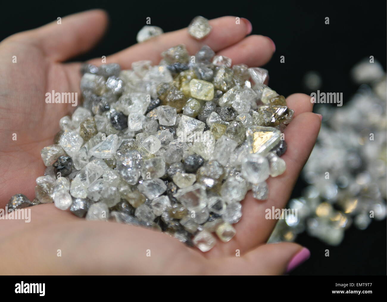 Hands Full Of Diamonds High Resolution Stock Photography and Images - Alamy