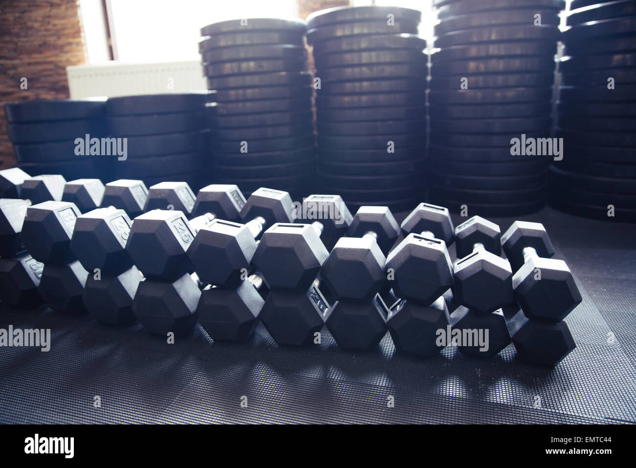 Closeup image of a dumbbells in gym Stock Photo - Alamy