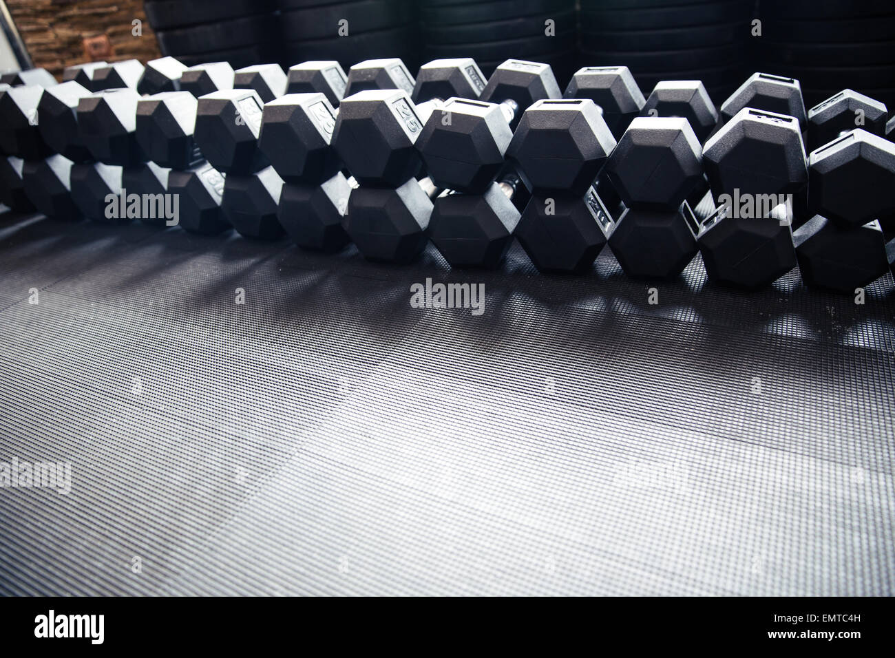 Closeup image of a dumbbells in gym Stock Photo - Alamy