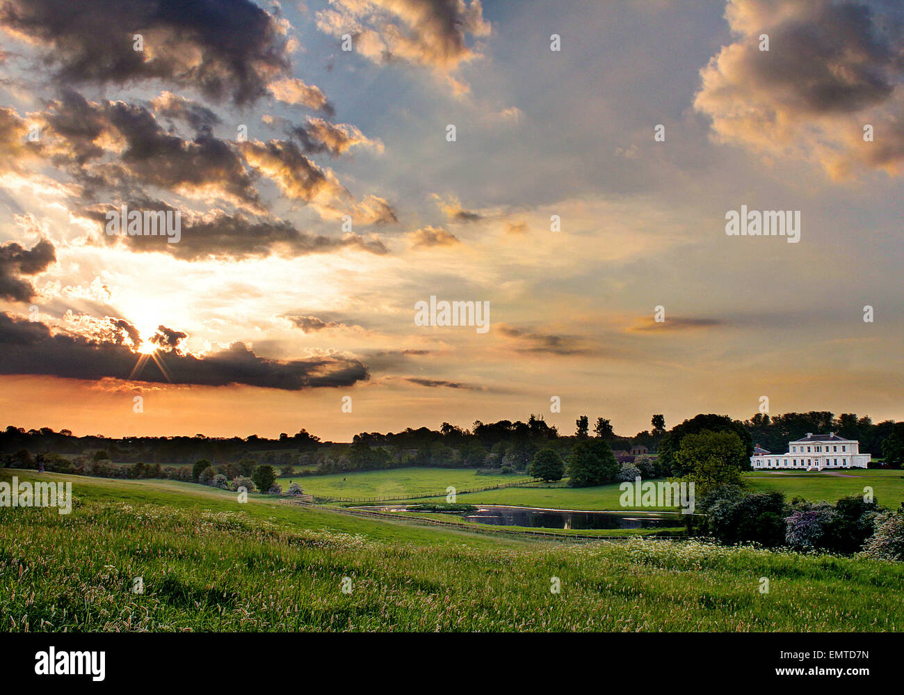 A mansion at sunset Stock Photo - Alamy