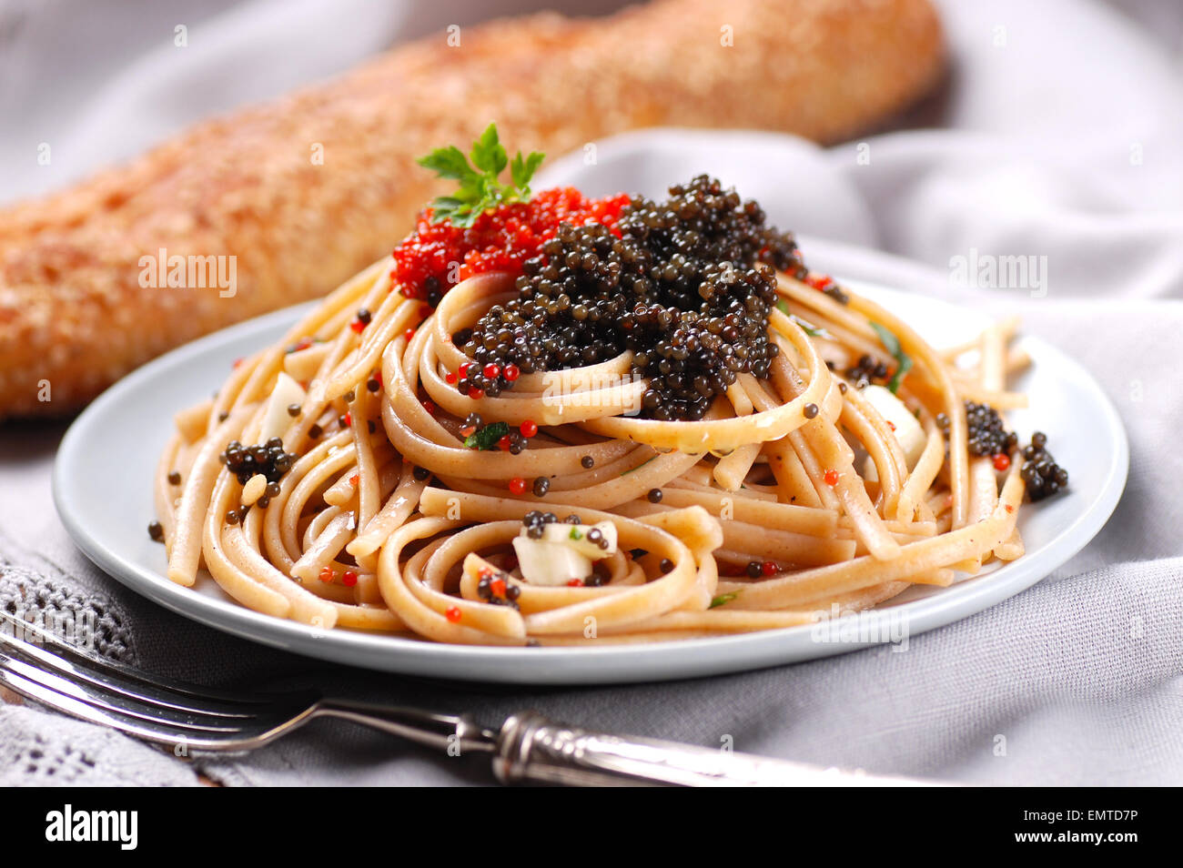 pasta with red and black lumpfish roe Stock Photo - Alamy