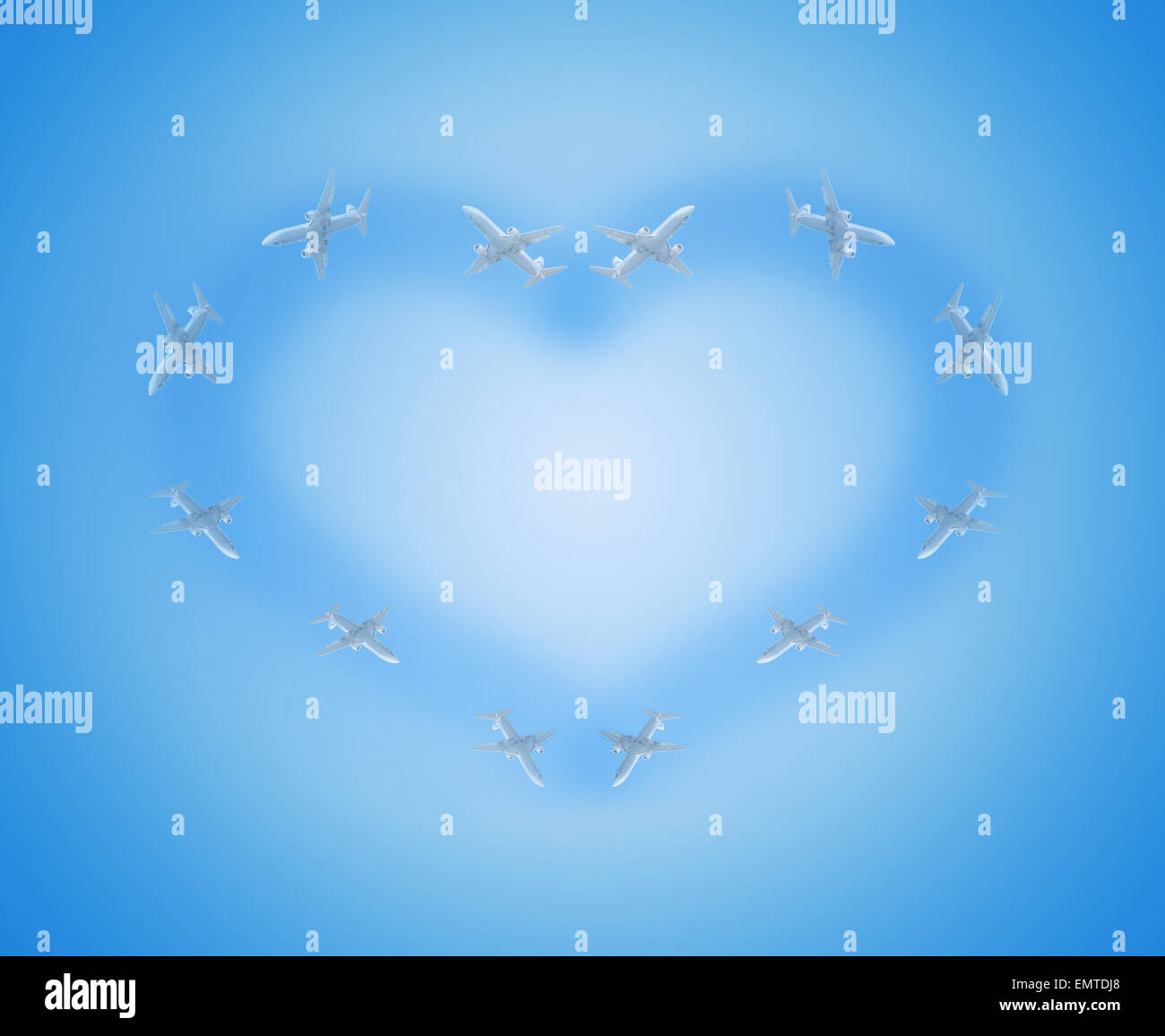 Heart shape from the airplanes in the blue sky Stock Photo - Alamy