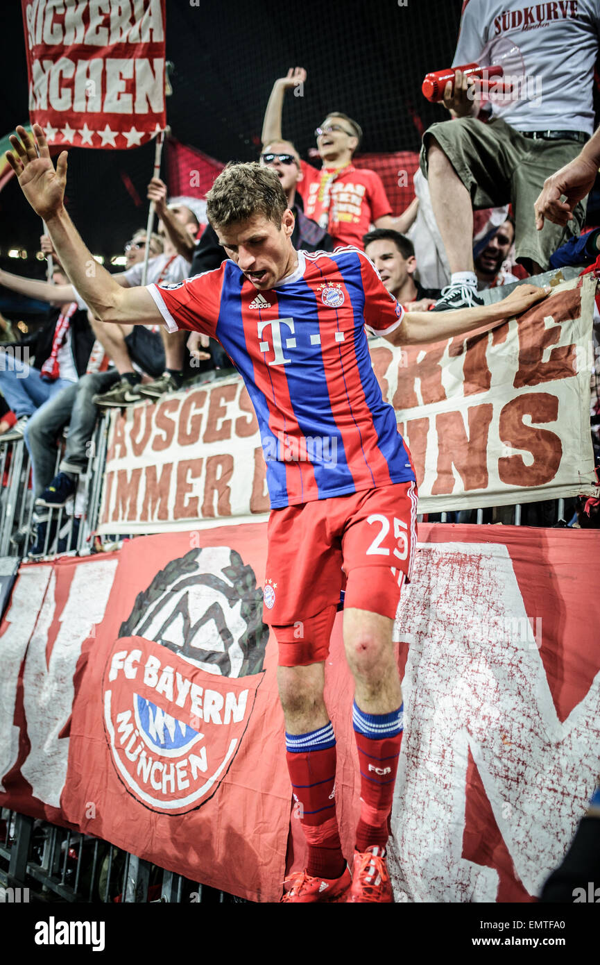 Munich, Germany. 21st Apr, 2015. Munich's Thomas Mueller celebrates ...