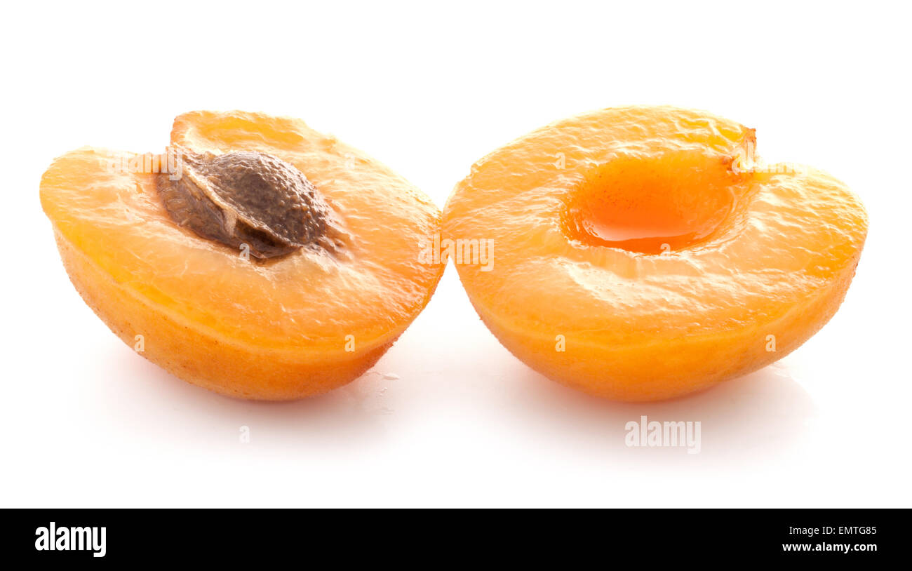 Apricot fruits - halves, isolated on white background Stock Photo - Alamy