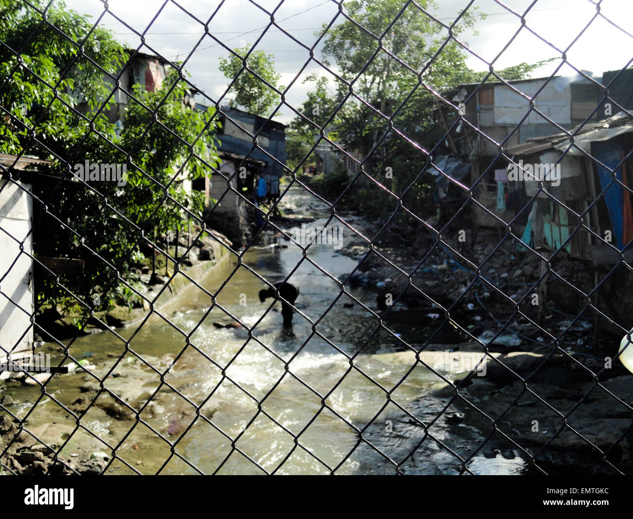 Quezon City, Philippines. 23rd Apr, 2015. A Filipino washes himself at ...